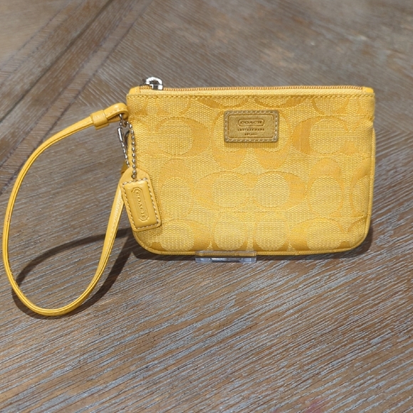 Coach | Bags | Coach Signature Yellow Wristlet | Poshmark